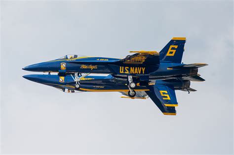 Why Does One Plane Fly Behind the Blue Angels? - Bolt Flight