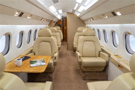 John Travolta's Falcon 900 Private Jet: A Deep Dive Into the Hollywood ...